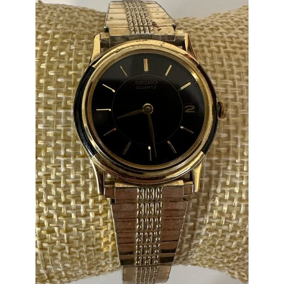 Seiko | Accessories | Seiko Quartz Gold Tone And Black Ladies Watch With Date Vintage | Poshmark